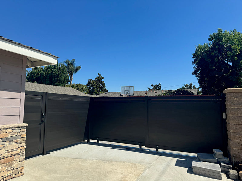 "Iron Master Gates & Fencing Custom Gates, Fencing & Railing Solution